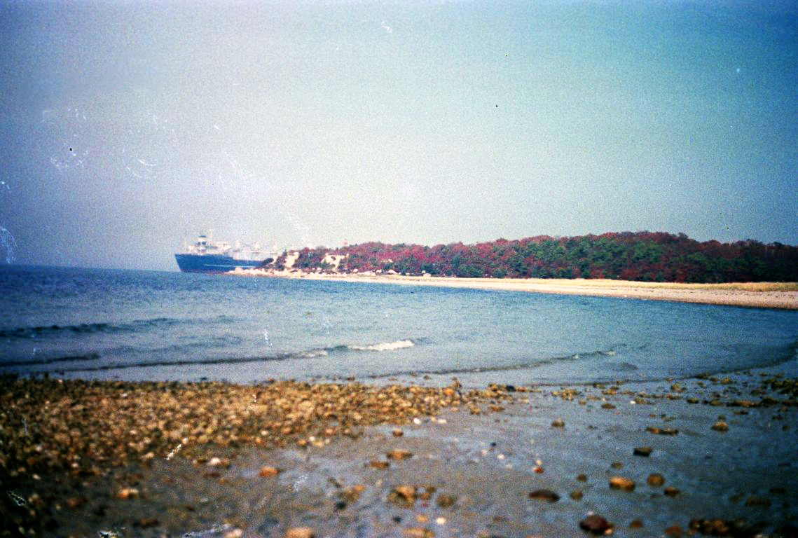 My first view of the canal from Mashnee, a freighter and boats passing ...